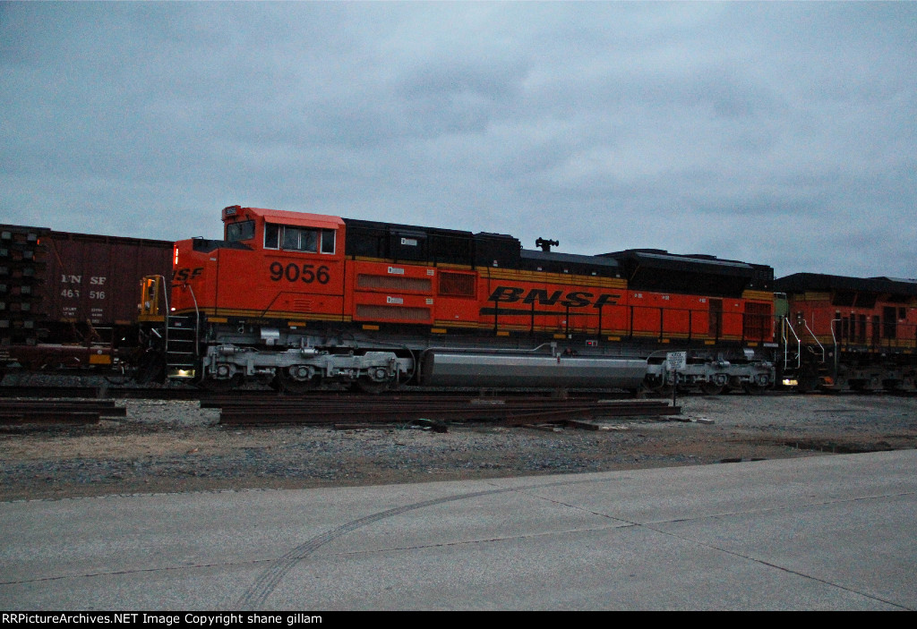 BNSF 9056 trails on the local.